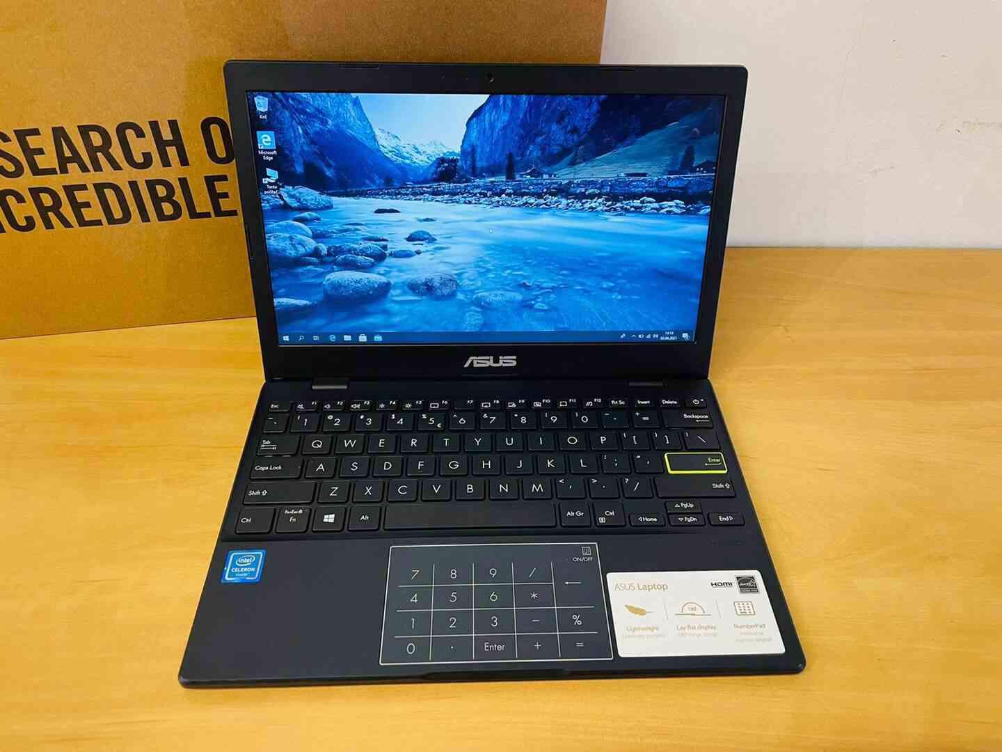 Asus E210M - bazar - Hyperinzerce.cz