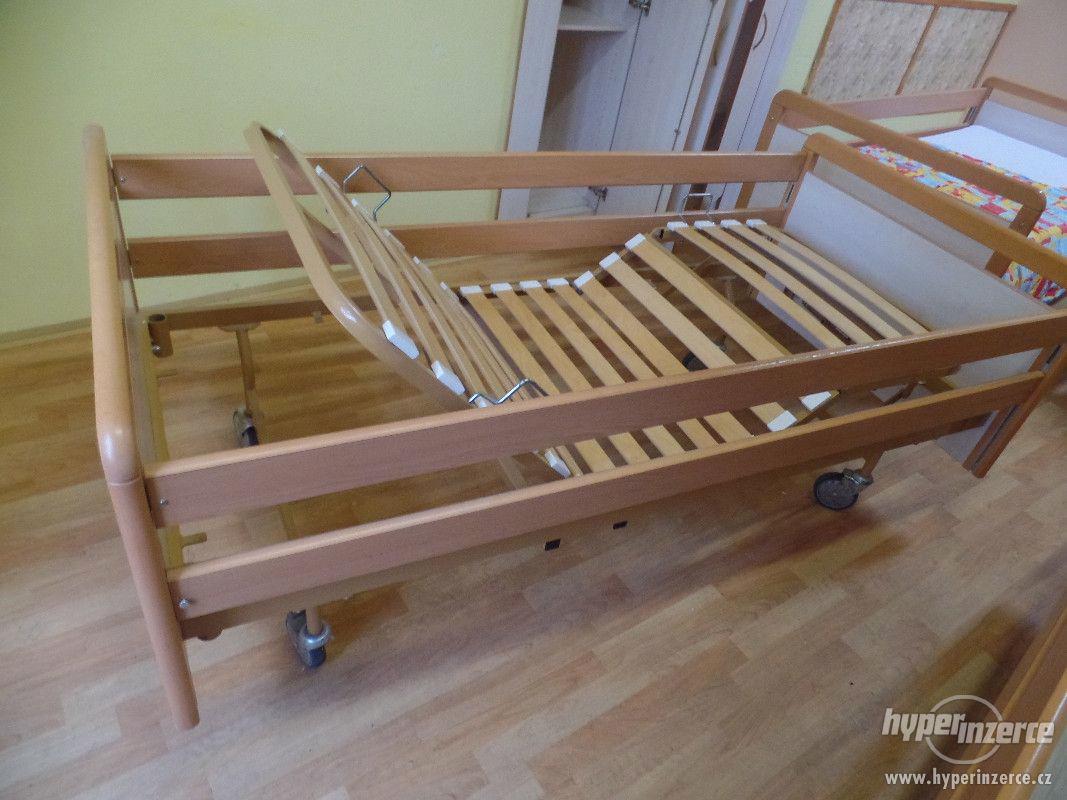 Lůžko mechanicky polohovací s hrazdou repasované - bazar - Hyperinzerce.cz